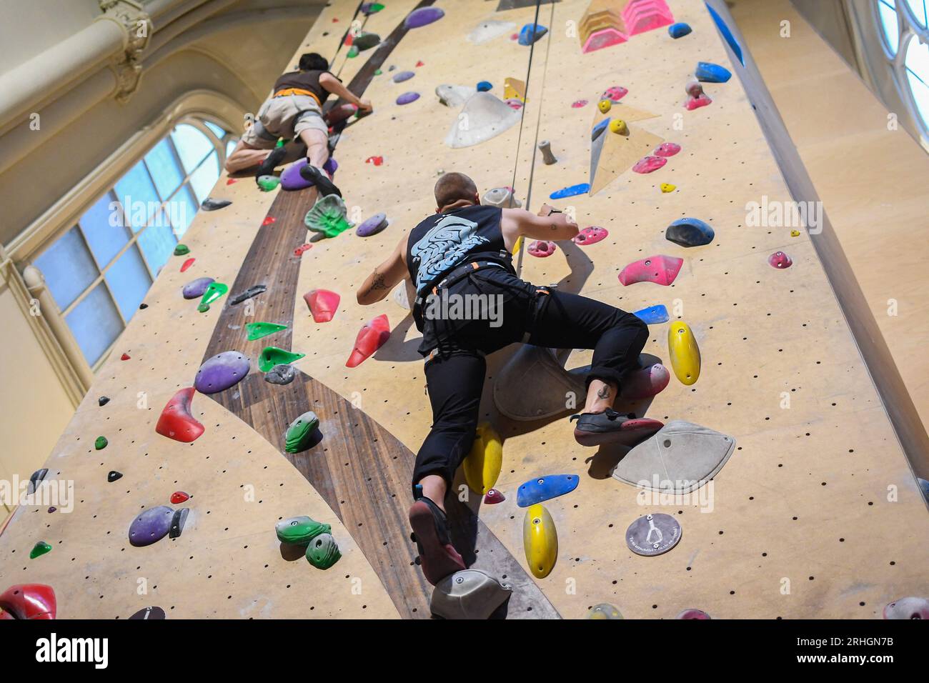 Climbers enjoy the new climbing wall opened by 'Climbing District' in ...