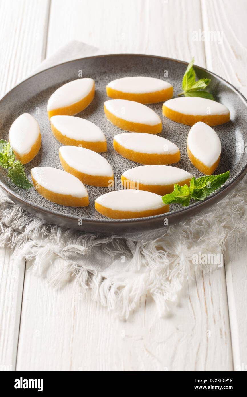 French candy Calissons consisting of pale yellow homogeneous paste of ...
