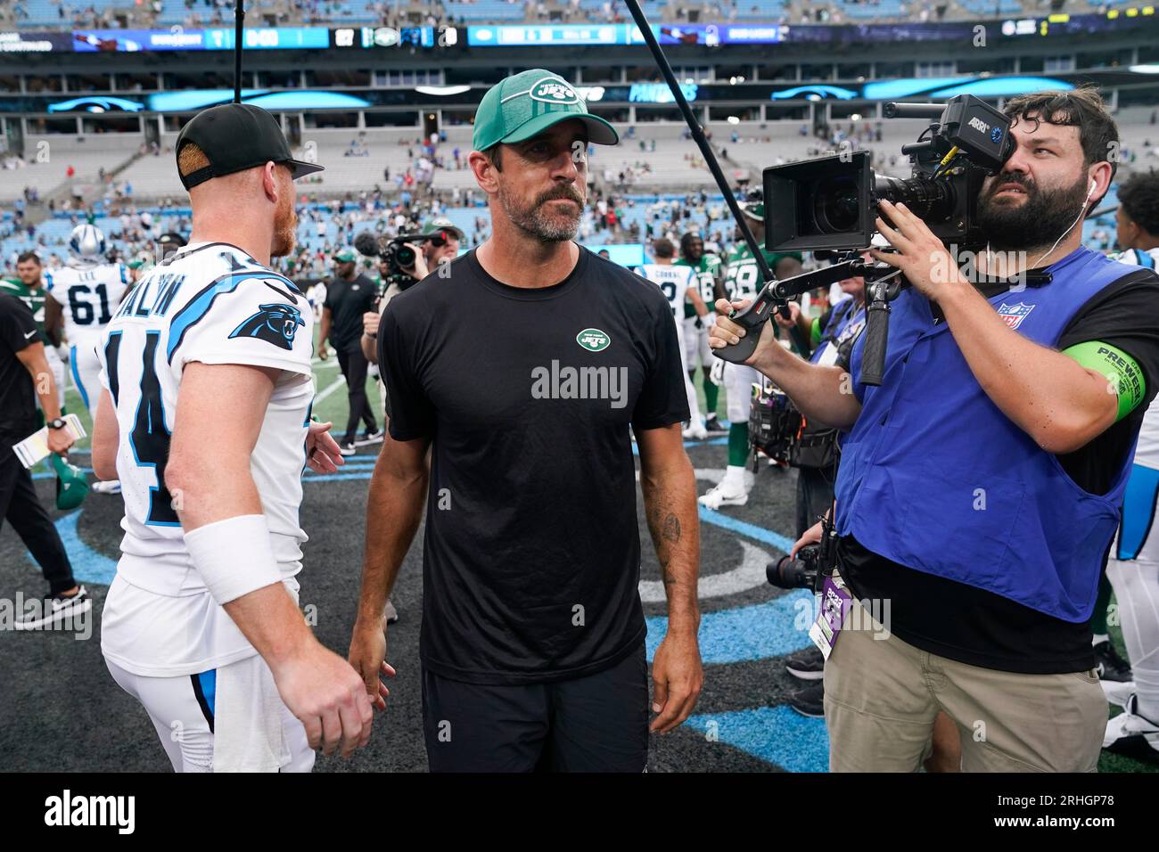 An NFL Films camera operator follows New York Jets quarterback Aaron ...