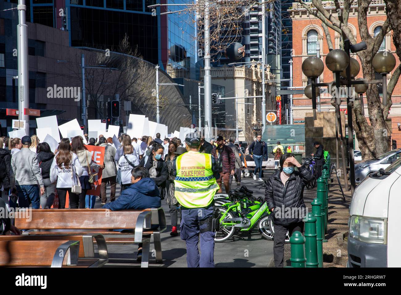 Sydney Australia New South Wales male police officer follows a peaceful ...