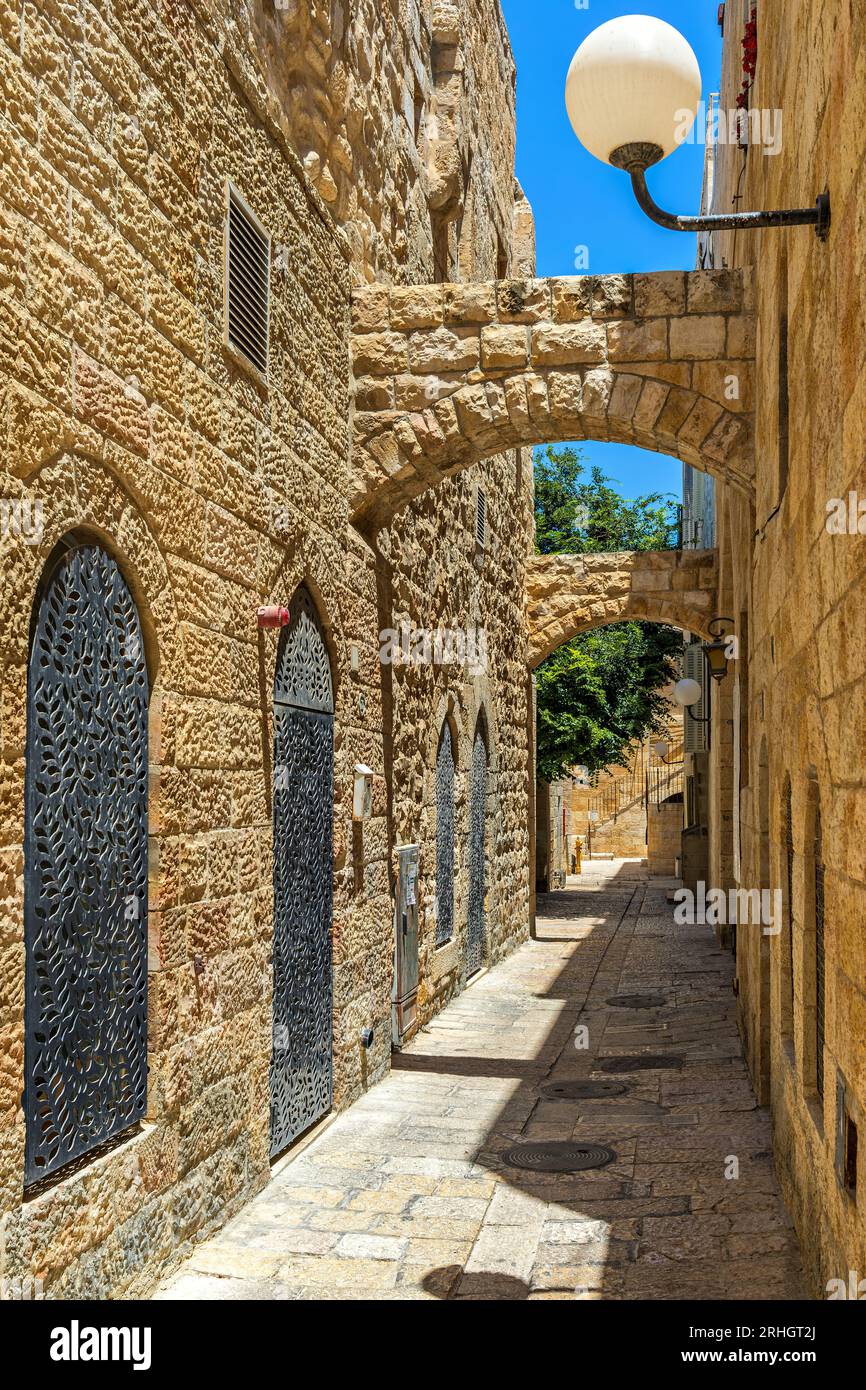 Stone walls along narrow street in jewish quarter in Old City of ...