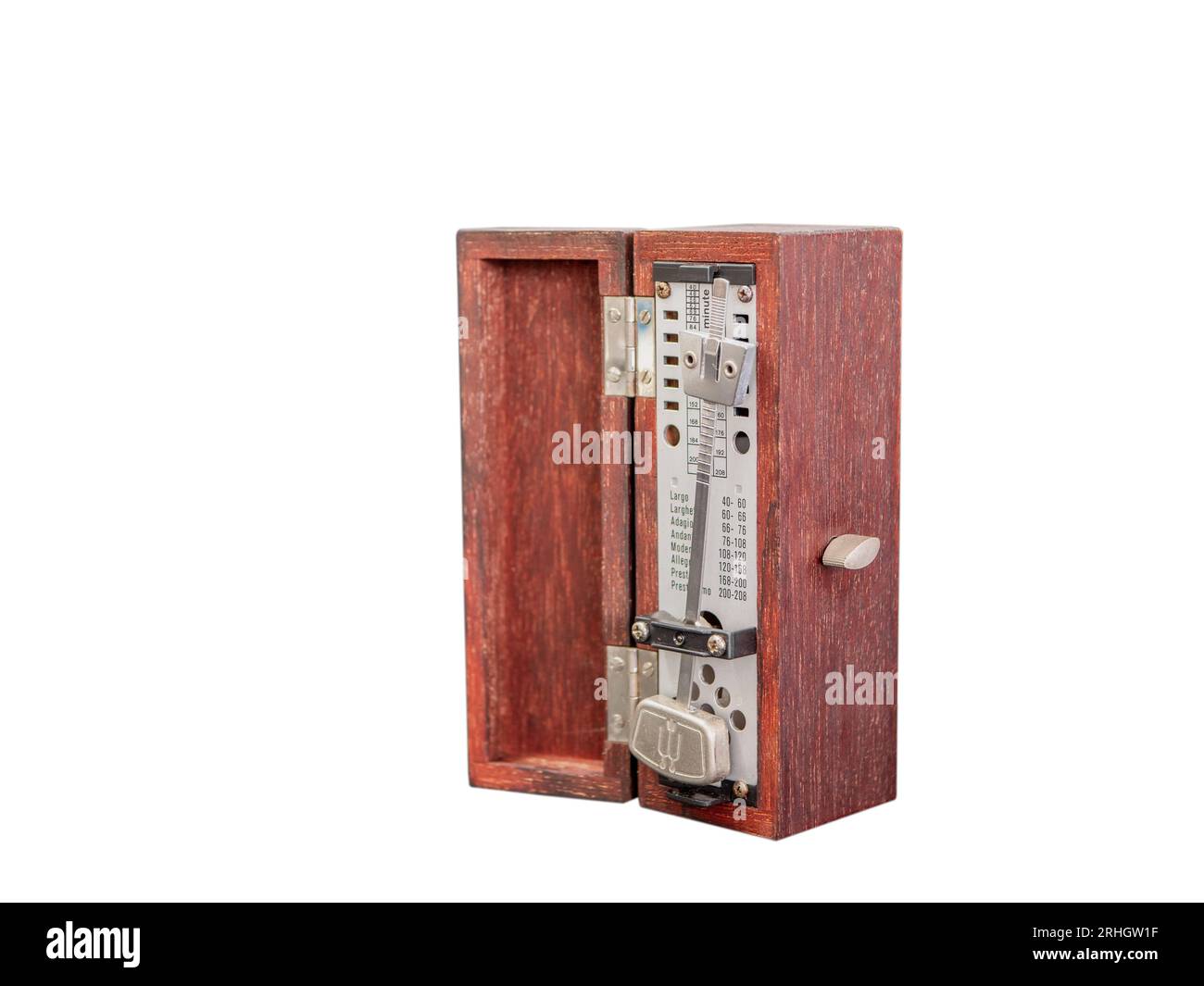 An old fashioned metronome ,made from wood box, white background Stock ...