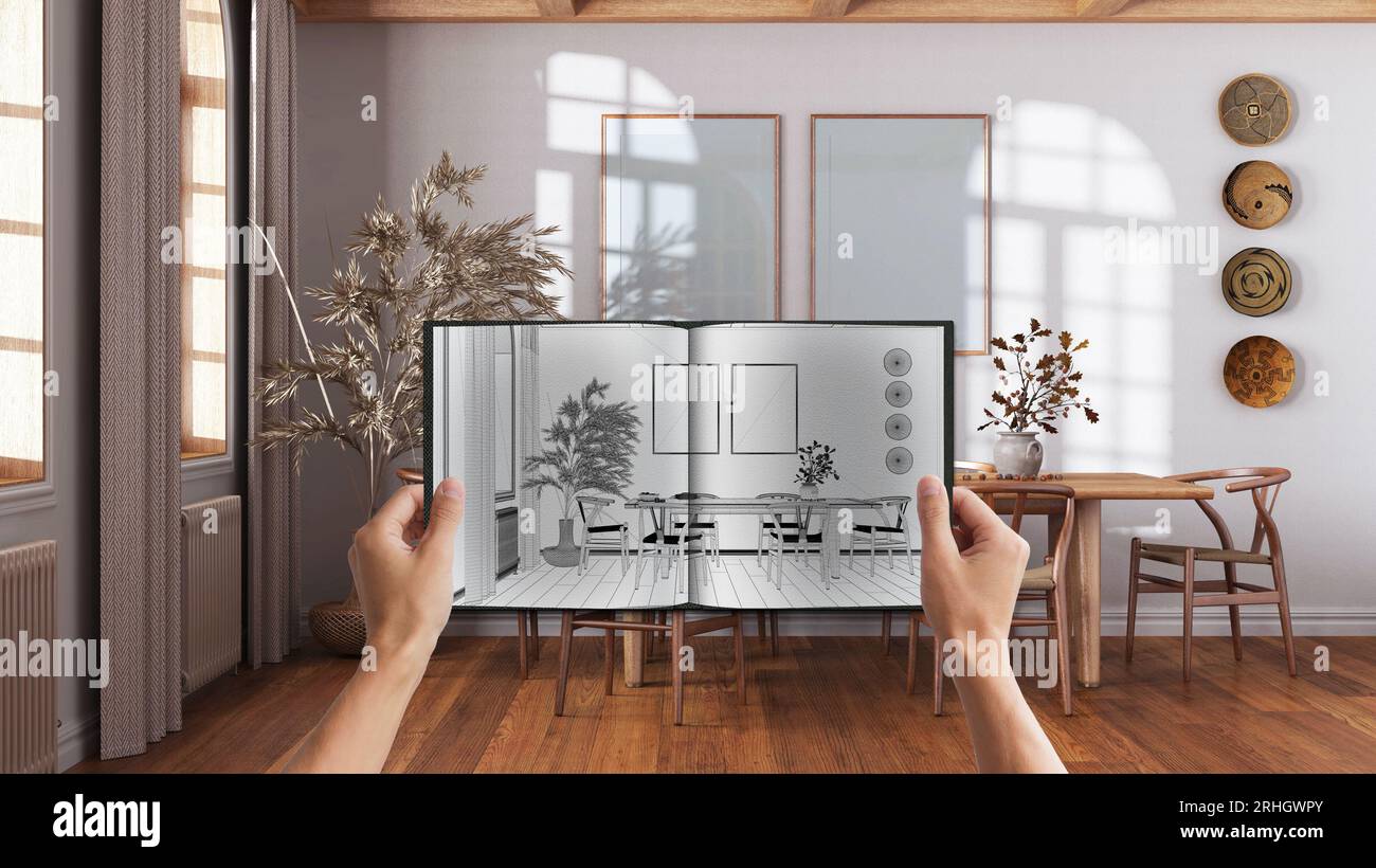 Hands holding notepad with boho style dining room blueprint sketch or drawing. Real interior ...