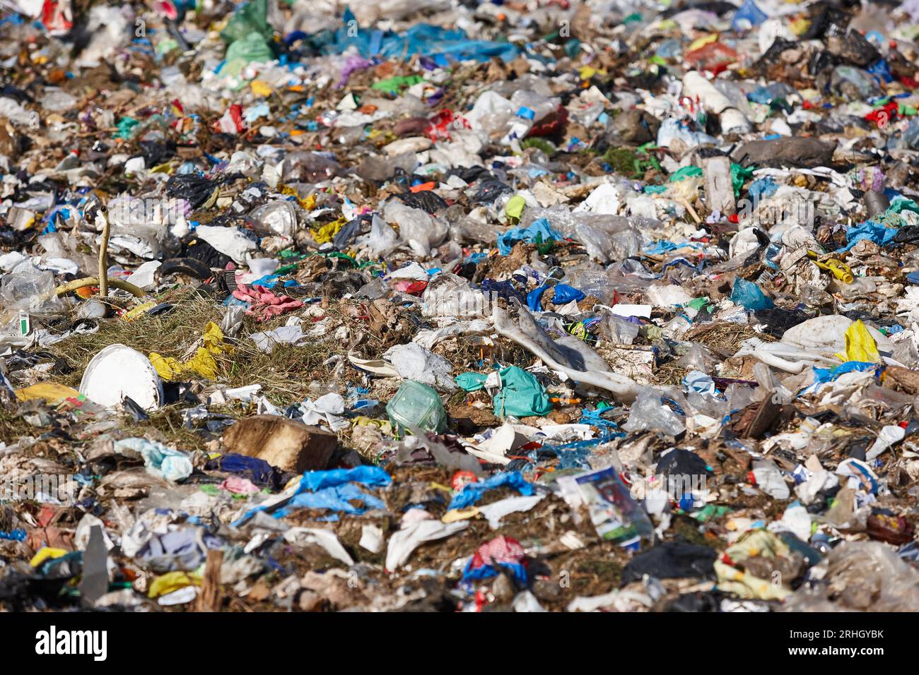 Open air garbage dump. Plastic pollution. Recycling junk. Consumerism ...