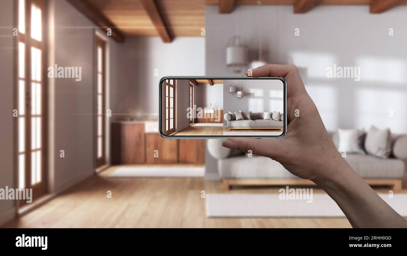 Hand holding smart phone, AR application, simulate furniture and ...