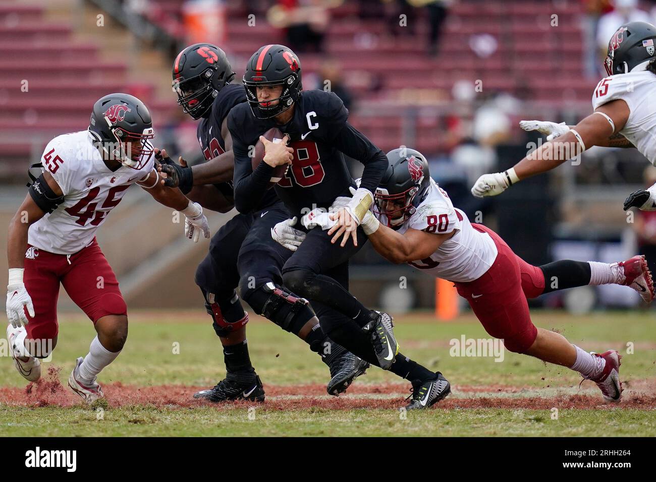 FILE - Washington State defensive end Brennan Jackson (80) tackles ...