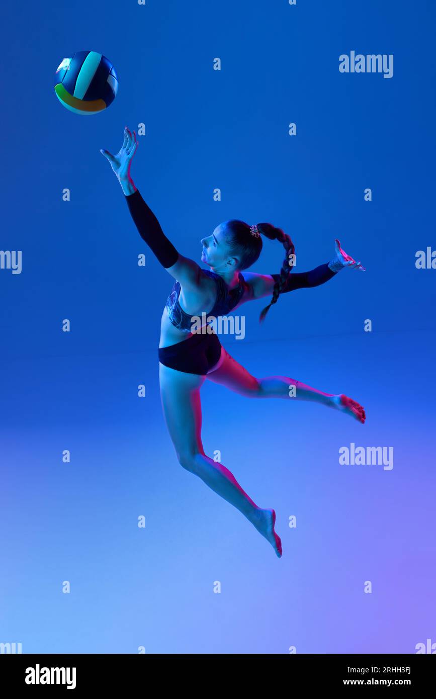 Top view of professional volleyball player, young woman in motion ...