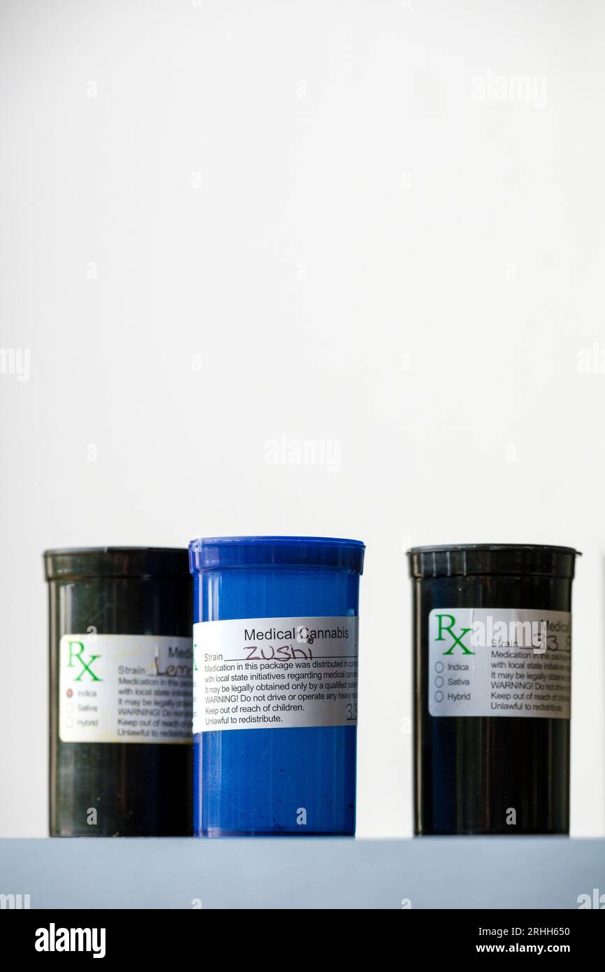 Small plastic tubs of Cannabis with labels stating it is "Medical ...