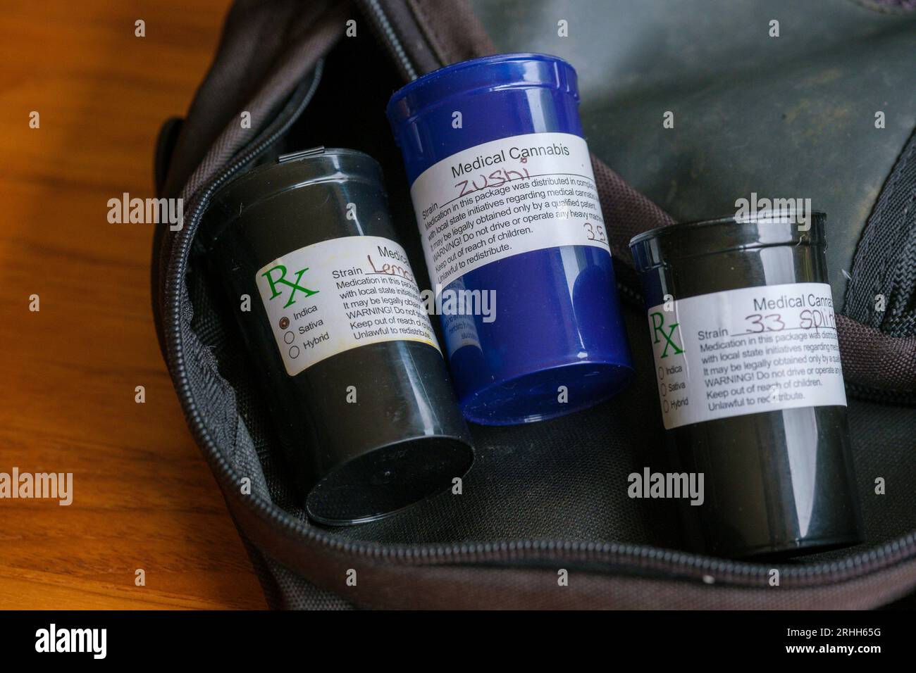 Small plastic tubs of Cannabis with labels stating it is "Medical ...