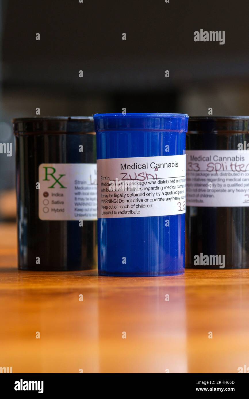 Small plastic tubs of Cannabis with labels stating it is "Medical ...