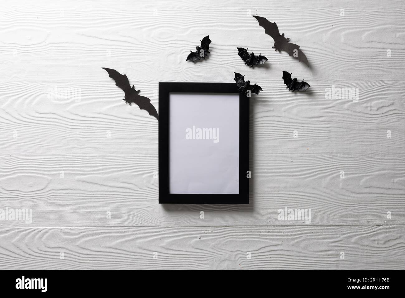 Black frame and bats with copy space on white background Stock Photo ...