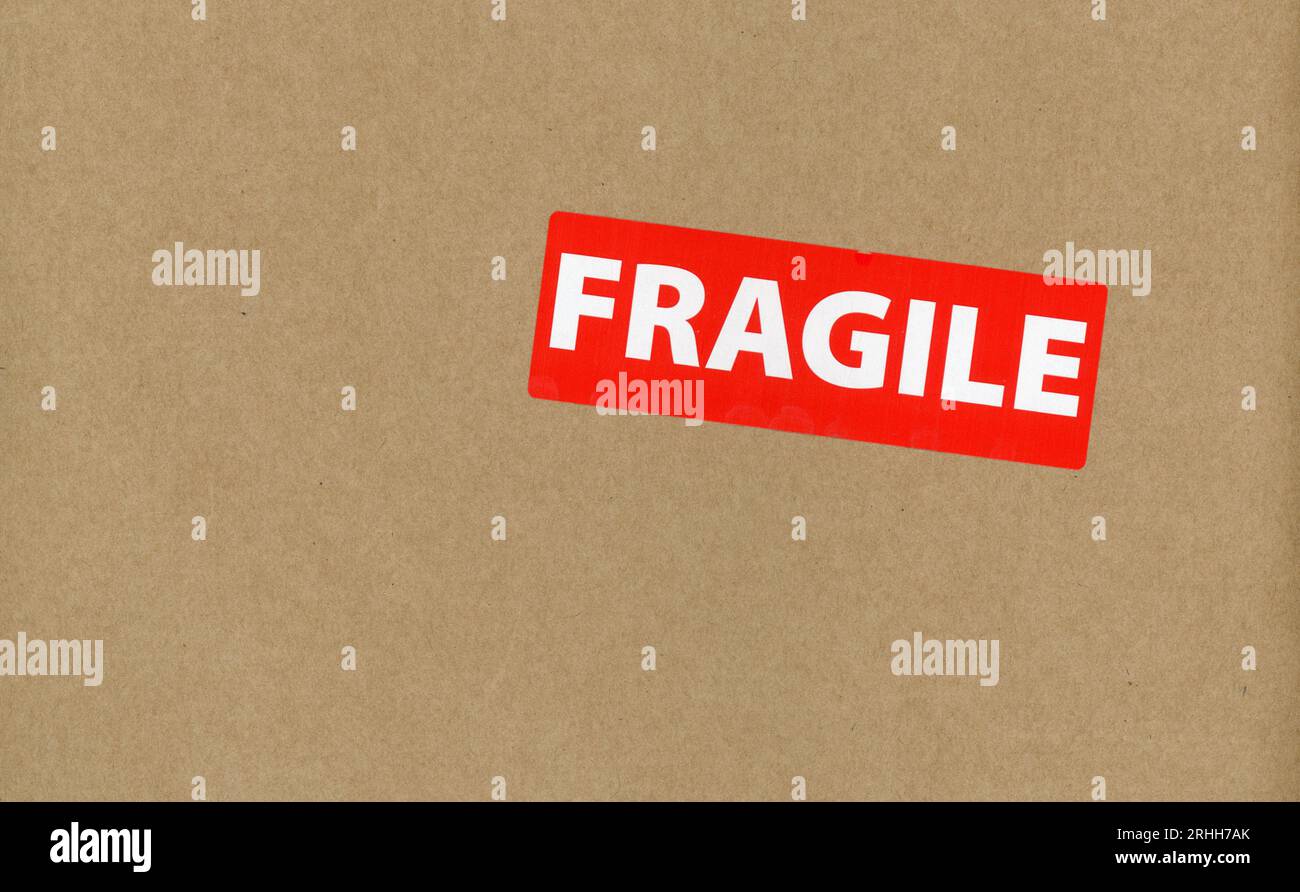 fragile label on a corrugated cardbord box Stock Photo - Alamy