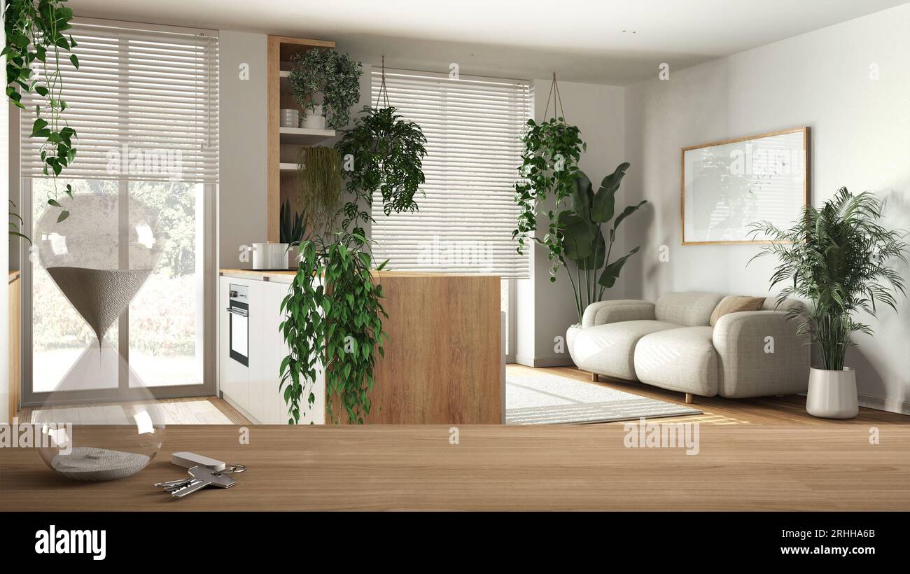 Wooden table or shelf with crystal hourglass measuring the passing time ...