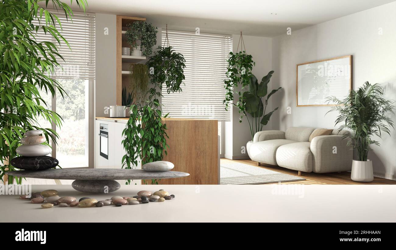 White table shelf with pebble balance and 3d letters making the word ...