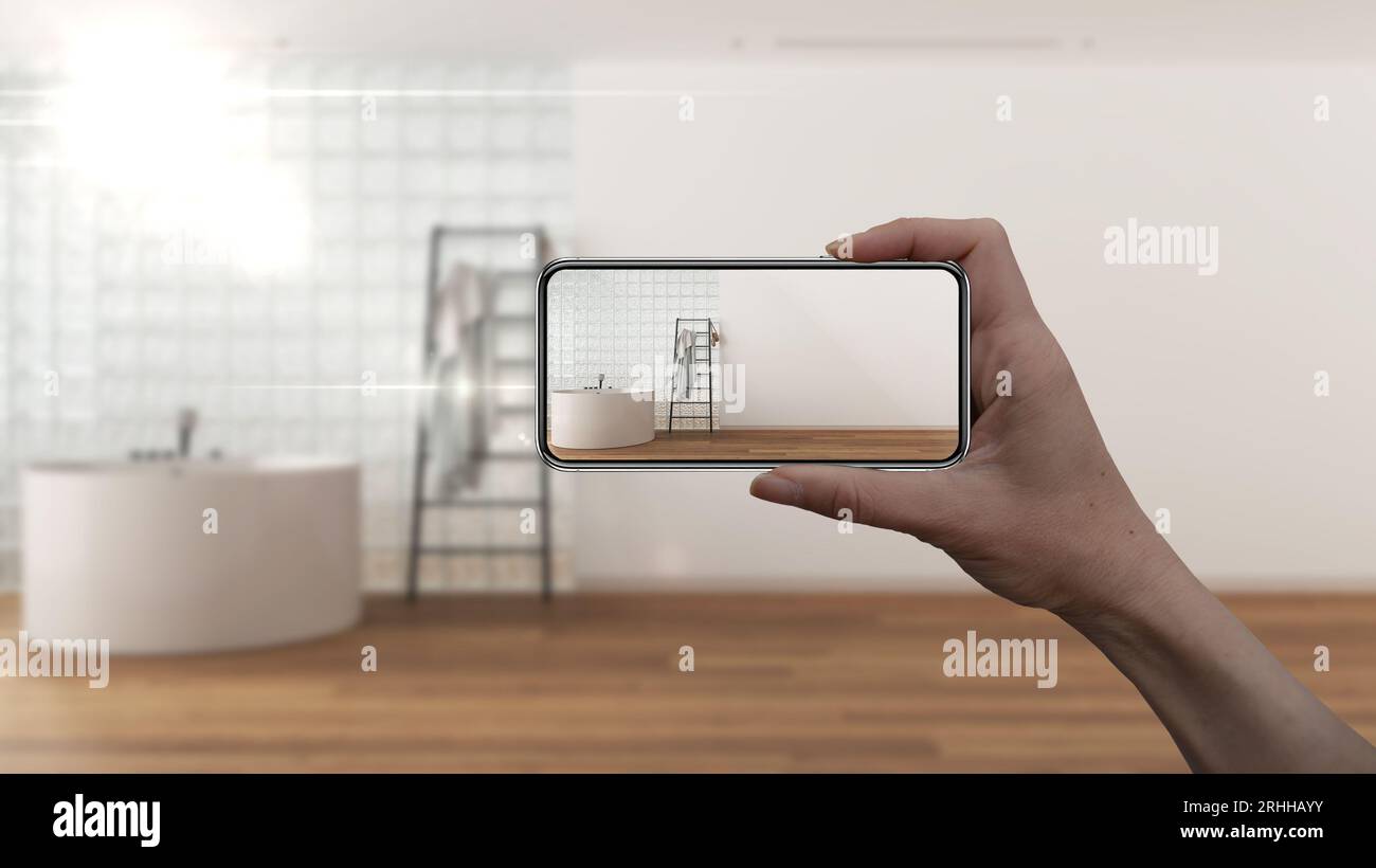 Hand holding smart phone, AR application, simulate furniture and ...