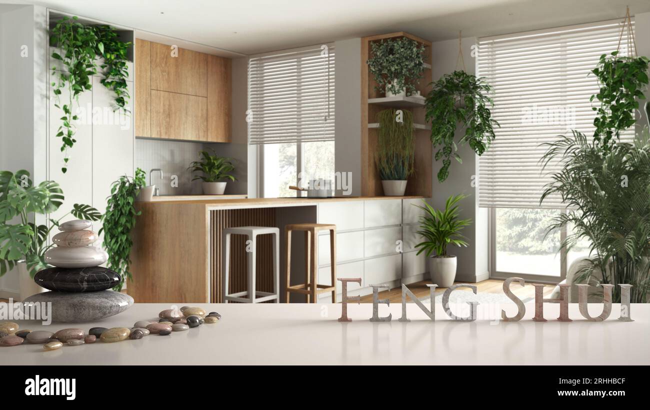 White table shelf with pebble balance and 3d letters making the word ...