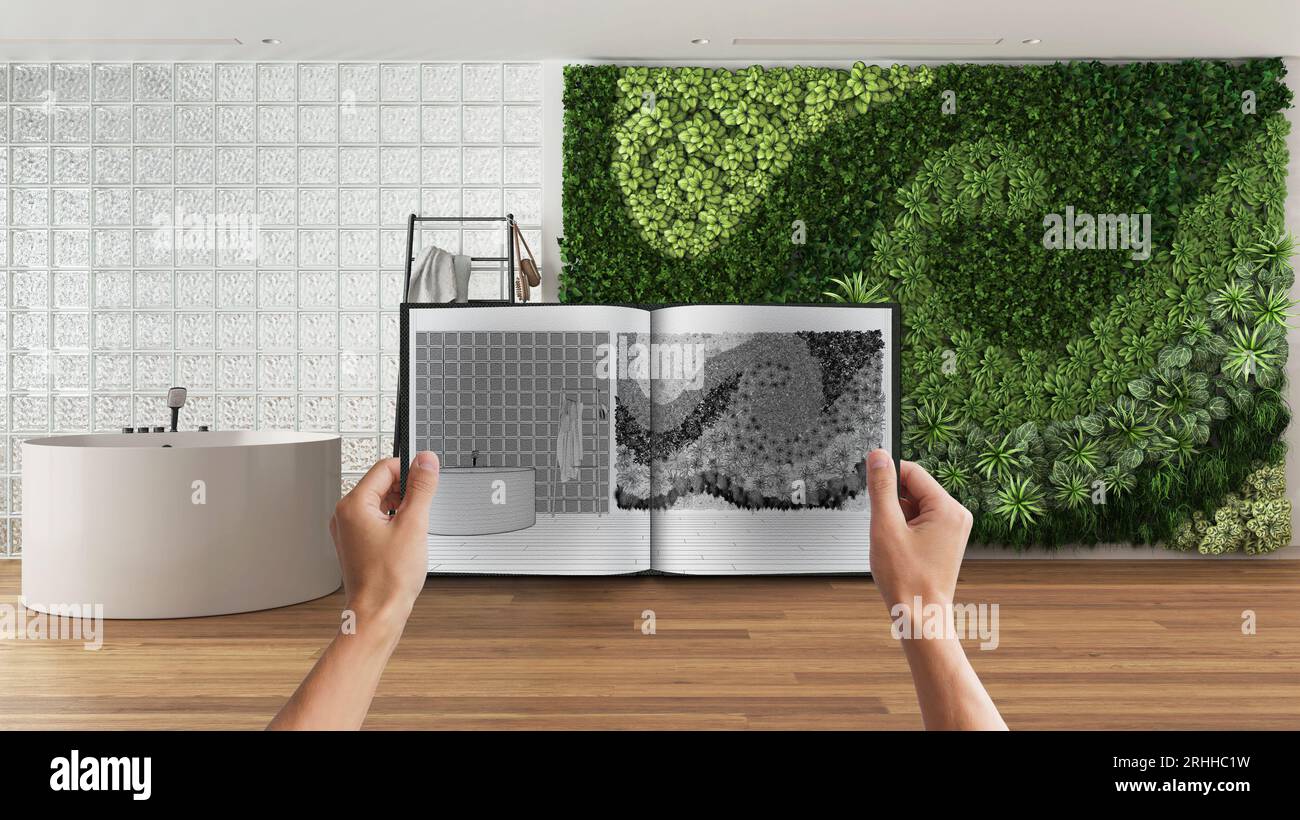 Hands holding notepad with minimal bathroom design blueprint sketch or ...