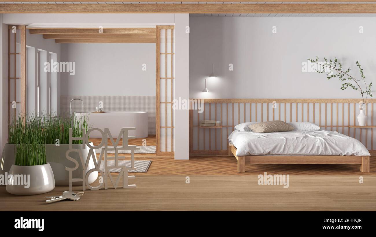 Wooden table, desk or shelf with potted grass plant, house keys and 3D letters home sweet home ...