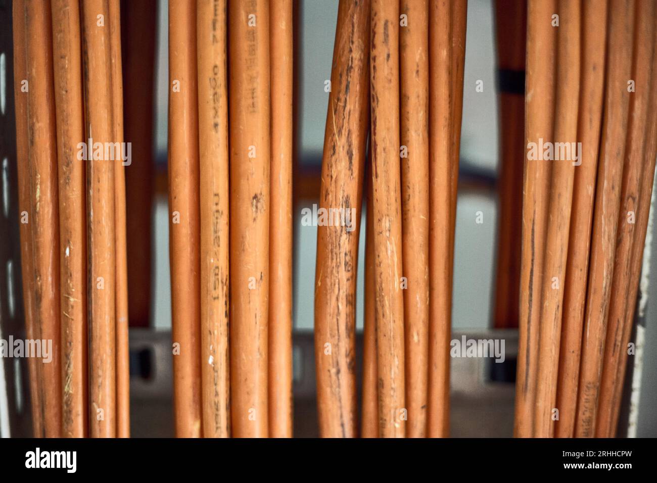 High power orange electric cable lines arranged in groups Stock Photo ...