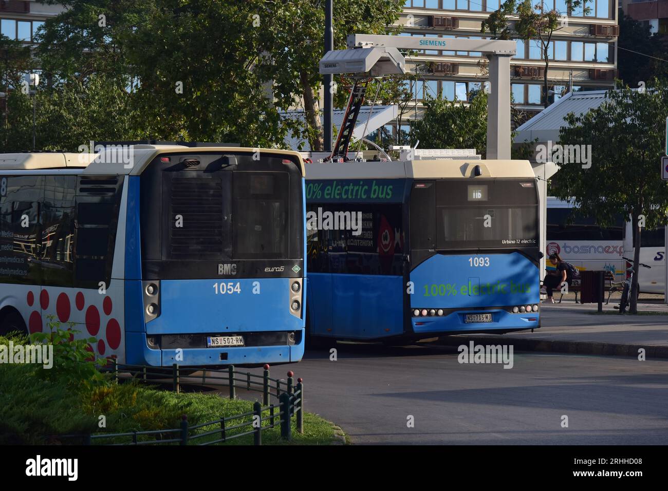 Public transport buses on a bus station. Mix of old and new, electric ...