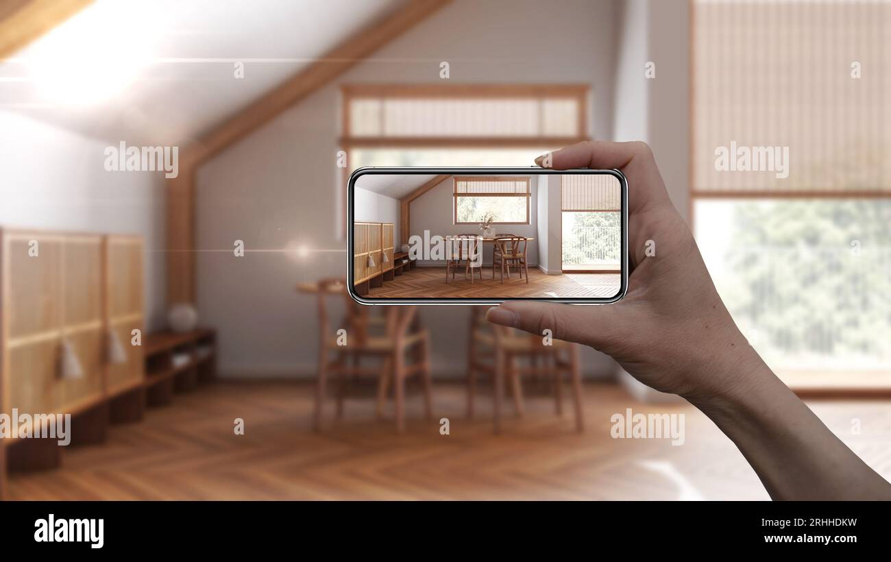 Hand holding smart phone, AR application, simulate furniture and ...