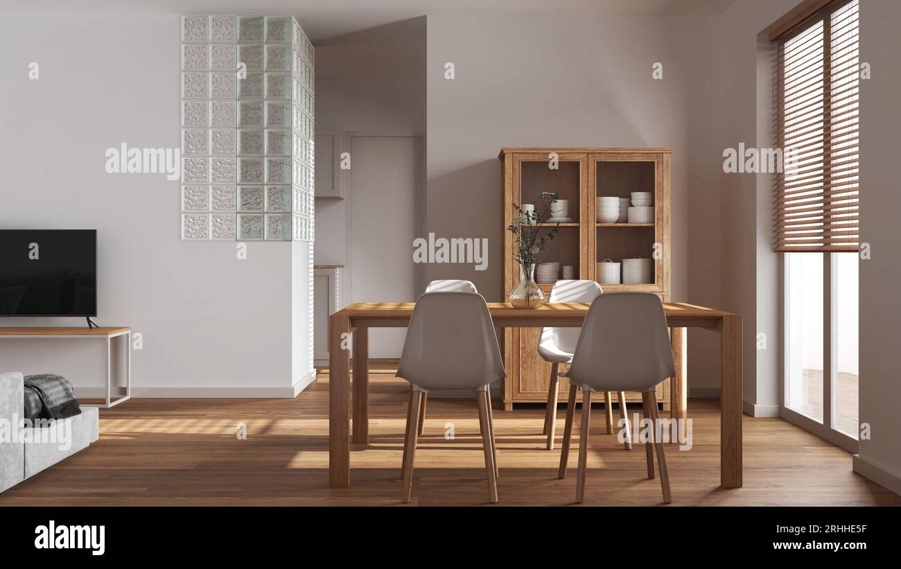 Scandinavian dining and living room in white tones. Wooden table with ...