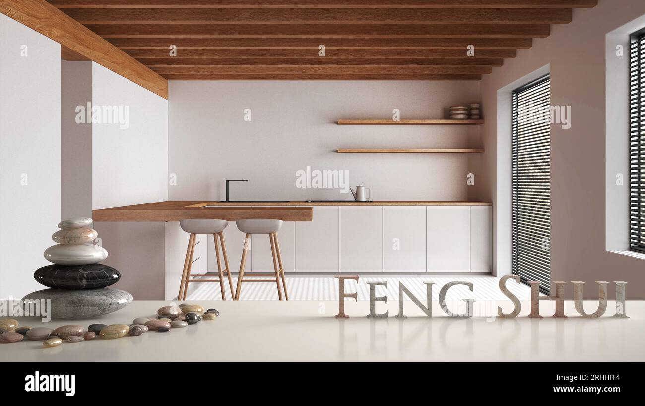 White table shelf with pebble balance and 3d letters making the word ...