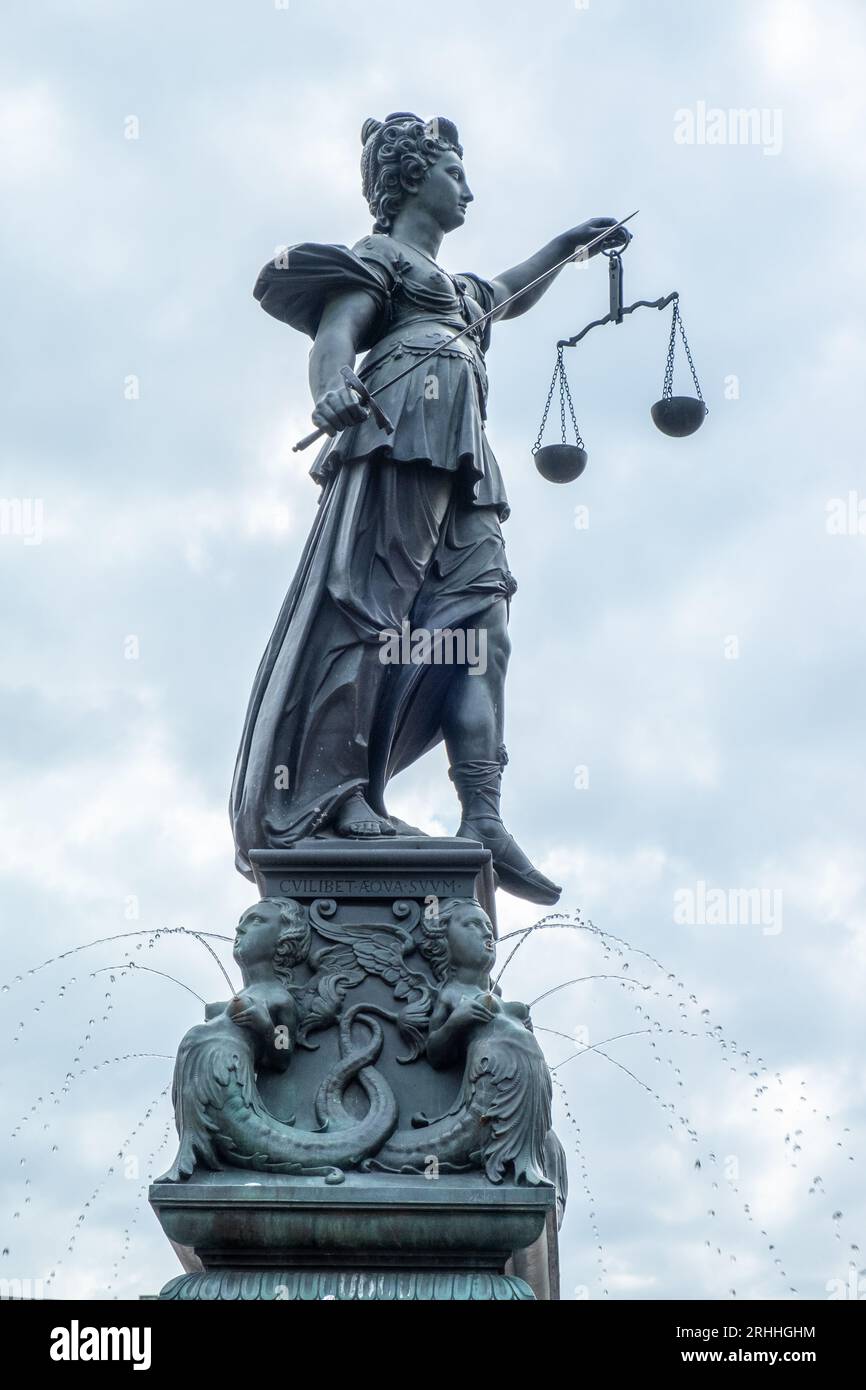 lady justice at the fountain at the Roemer square in Frankfurt, Germany ...