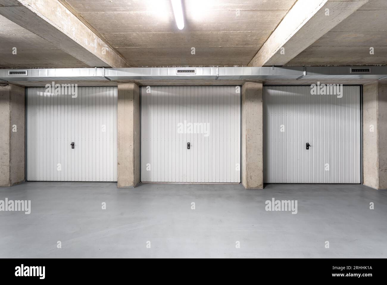 parking place, garage space in the underground building Stock Photo - Alamy