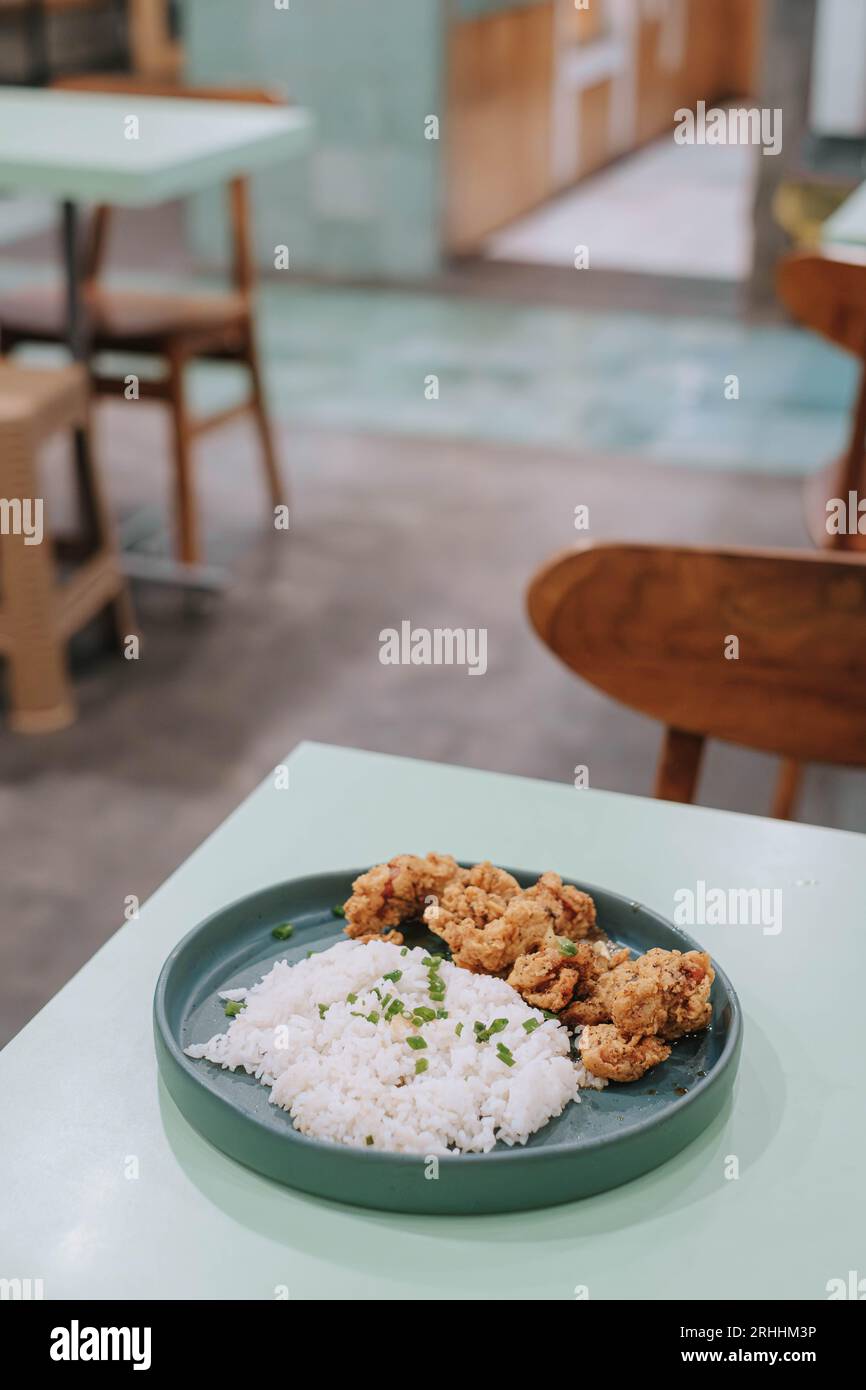 Portrait or vertical and selective focus shot of a plate of fried ...