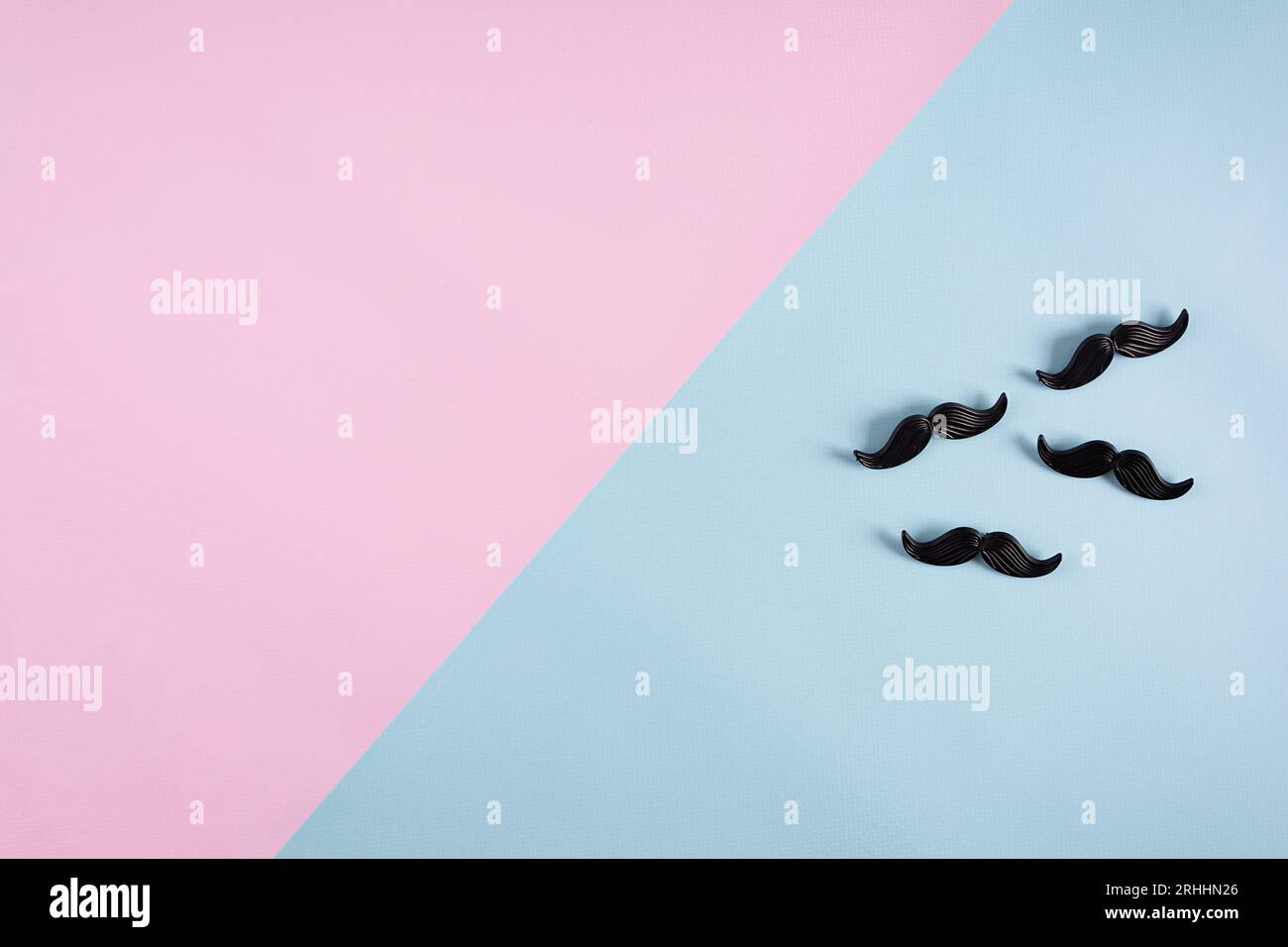 Curly mustaches on colorful background. Fake mustache. Top view Stock ...