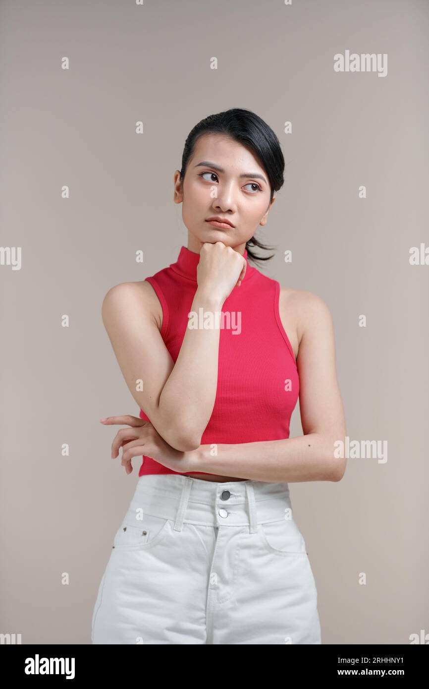 asian woman thinking worried about a question, concerned and nervous ...