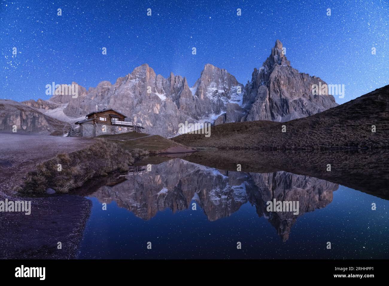 Incredible night landscape with a reflection of starry sky and ...