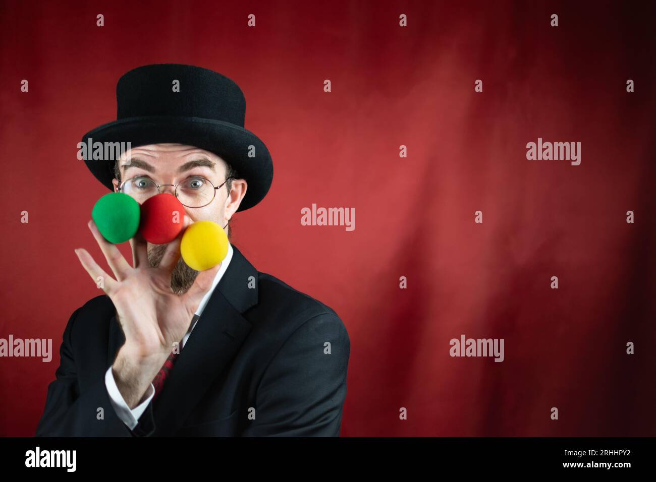 Vintage Caucasian Magician with top hat, glasses and mustache with ...