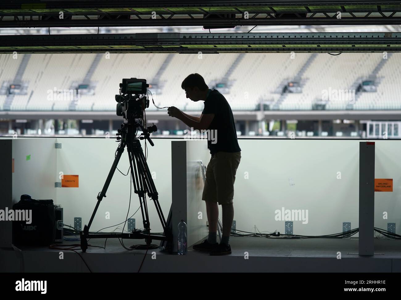 Budapest, Hungary. 17th Aug, 2023. A cameraman prepares his camera for ...