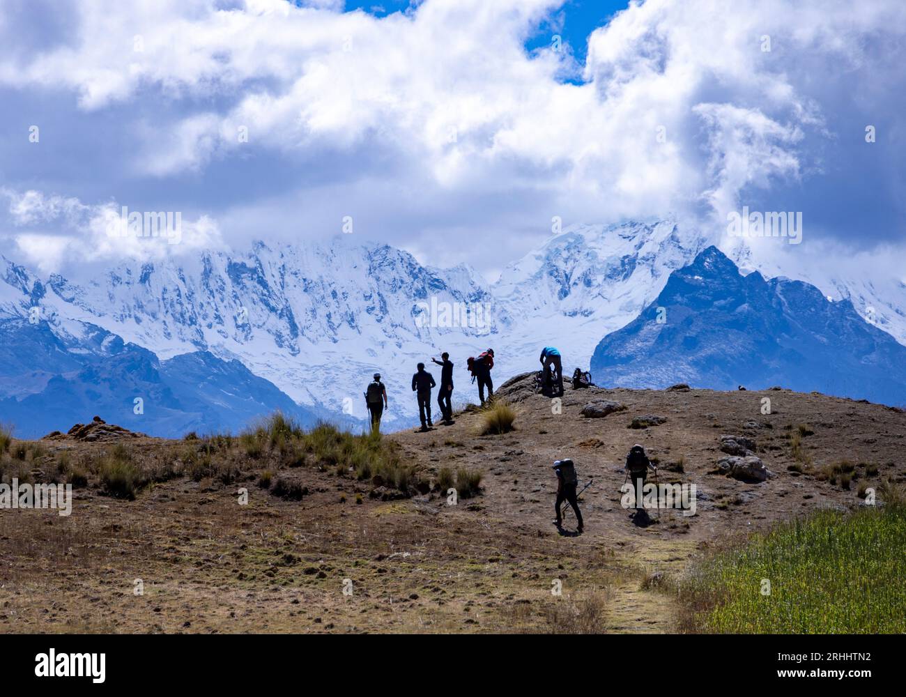 hikers looking at the view of the Cordillera Blanca mountain range from ...