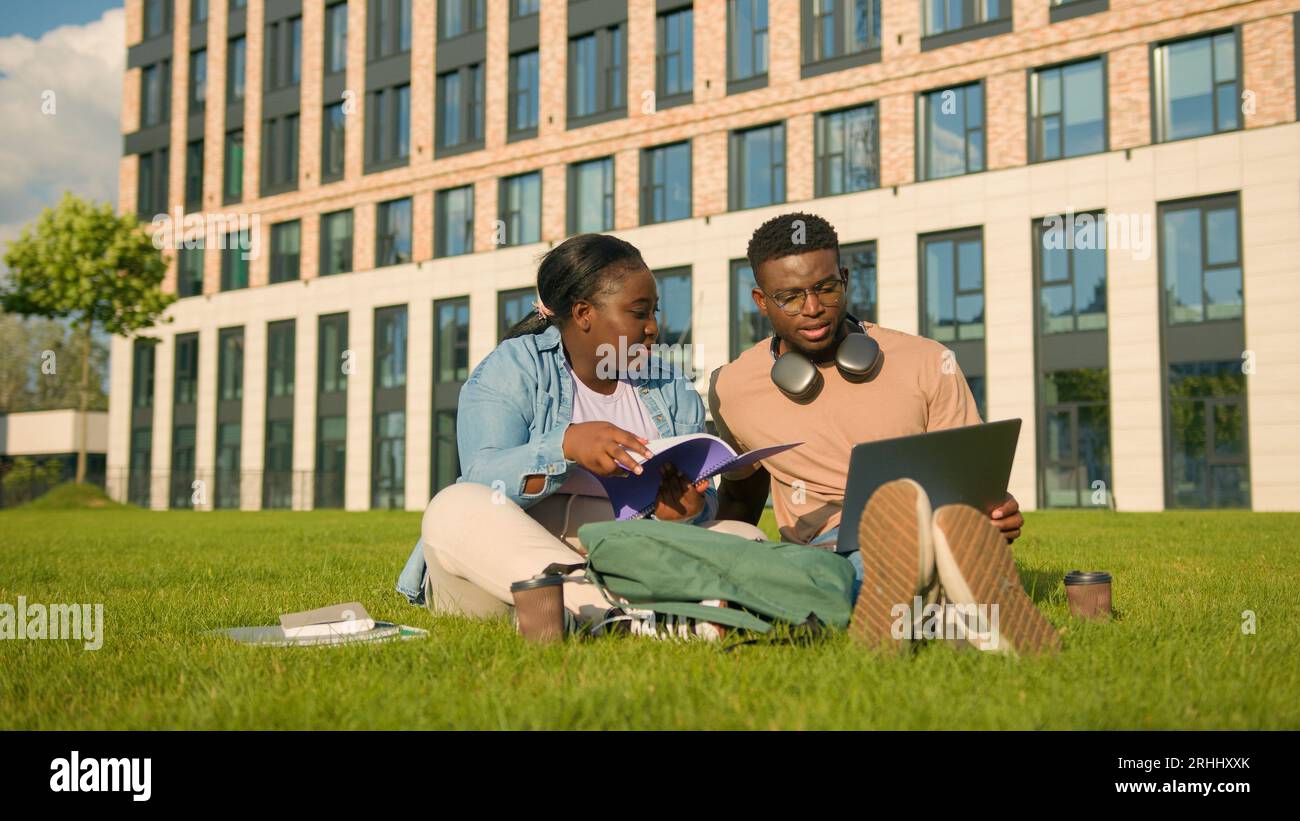 Classmates project outside laptop hi-res stock photography and images ...