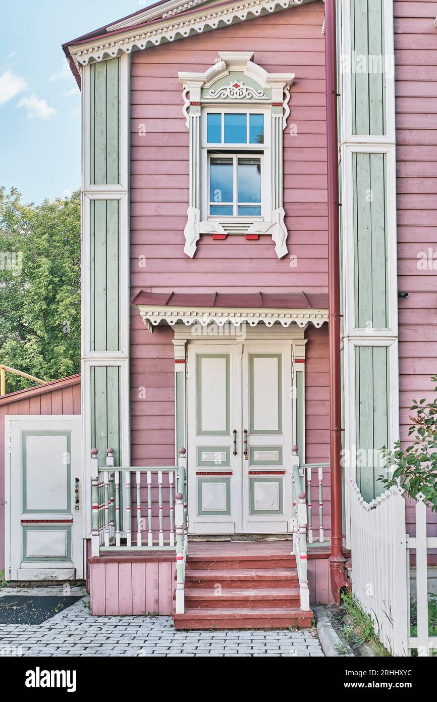 Annex, porch, window with carved architraves, pink boardwalk facade ...