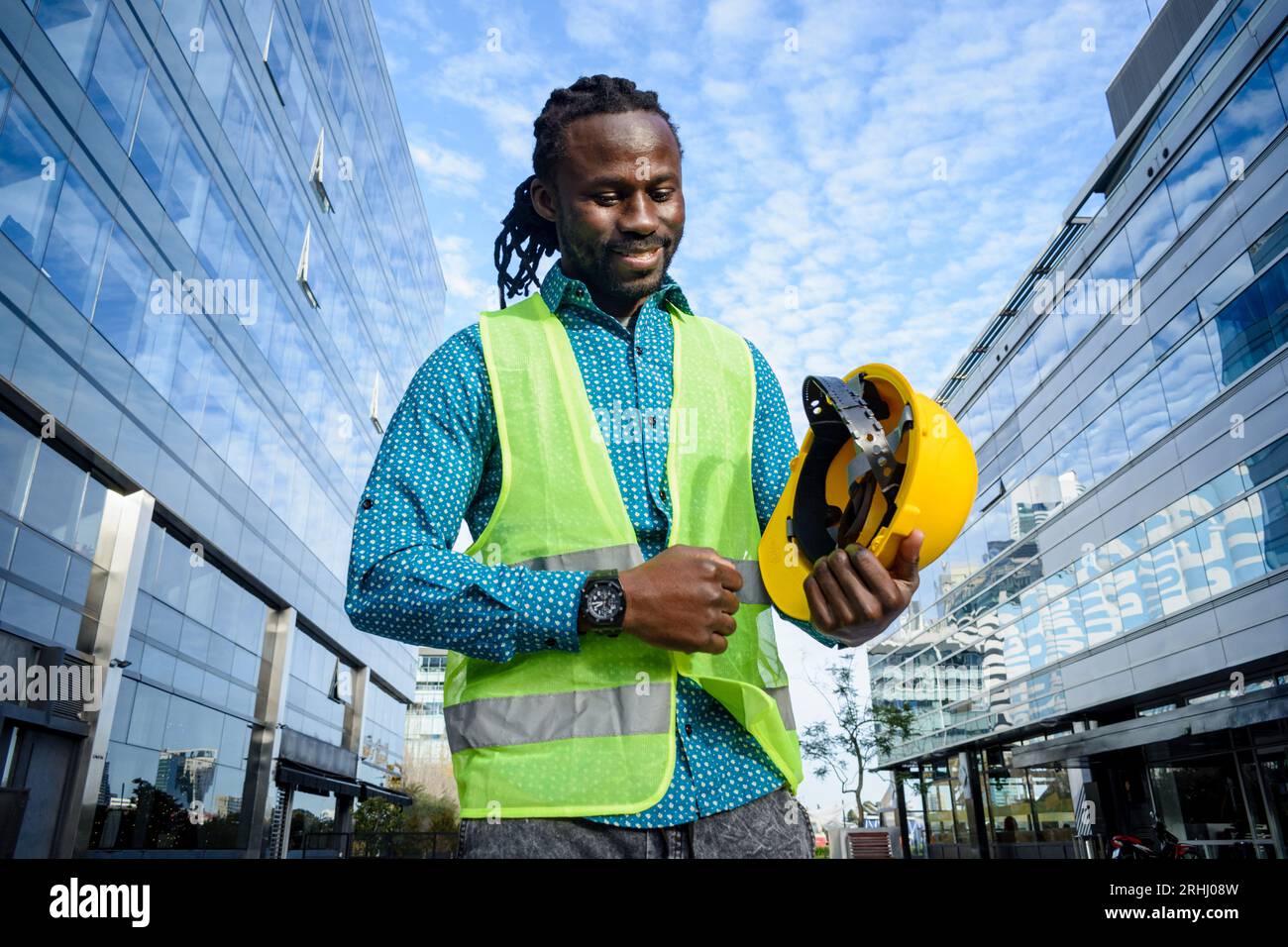 young civil engineer man of african ethnicity with beard and dreadlocks ...