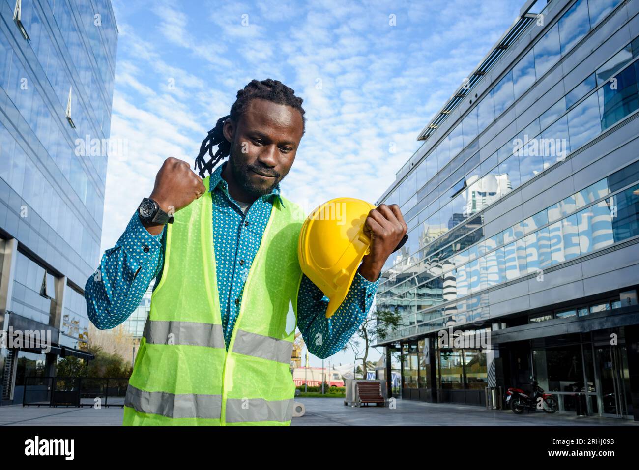 young civil engineer man of african ethnicity standing outside work ...