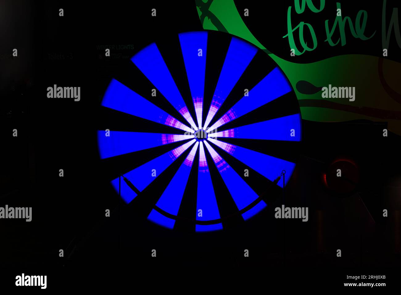 A spinning disc of neon light - Canary Wharf Winter Lights art festival ...