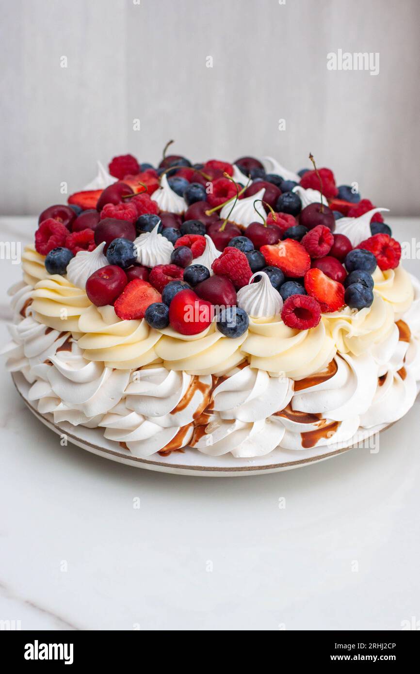 Pavlova Berry Cake with salted caramel sauce, ffresh raspberries ...