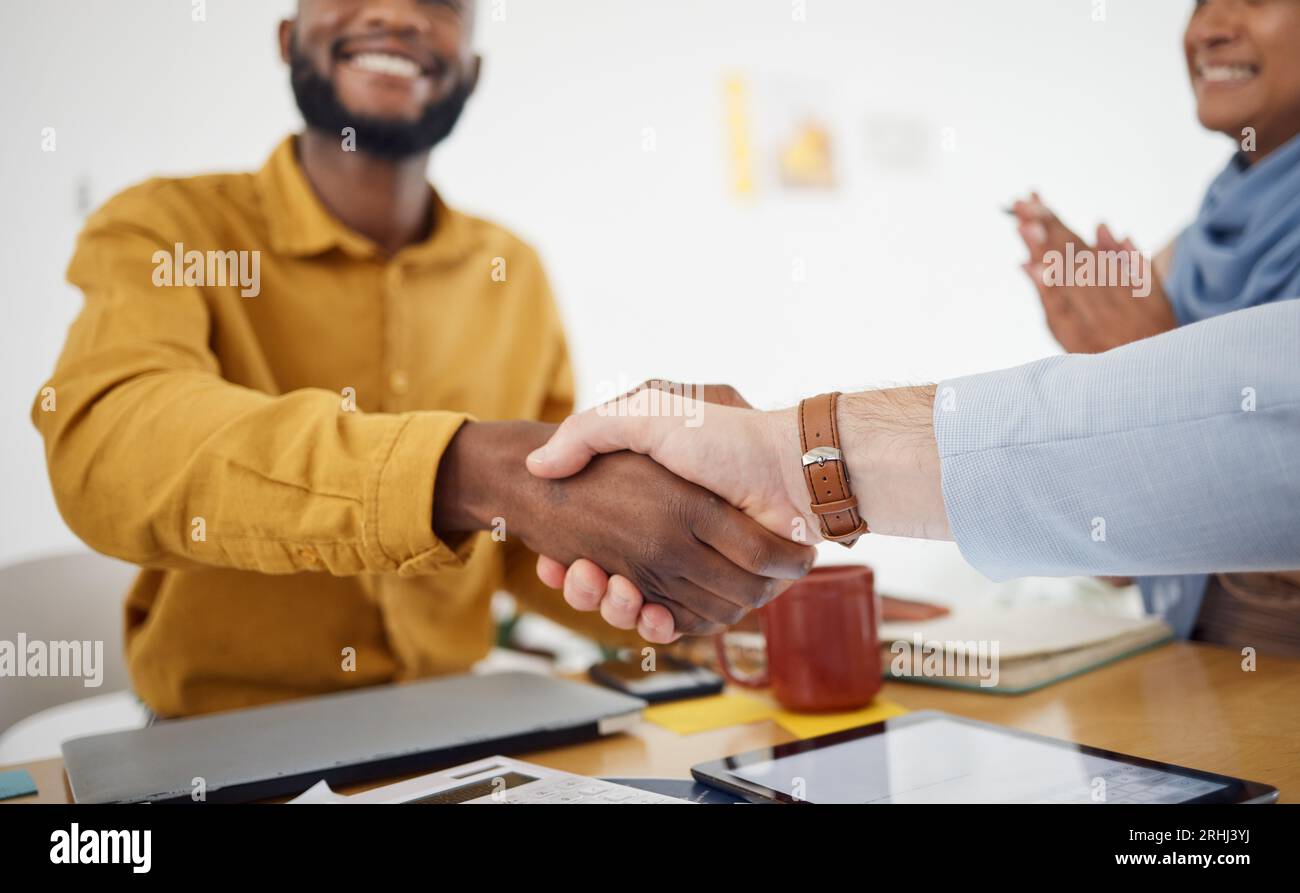 Creative people, handshake and meeting in celebration, promotion or ...