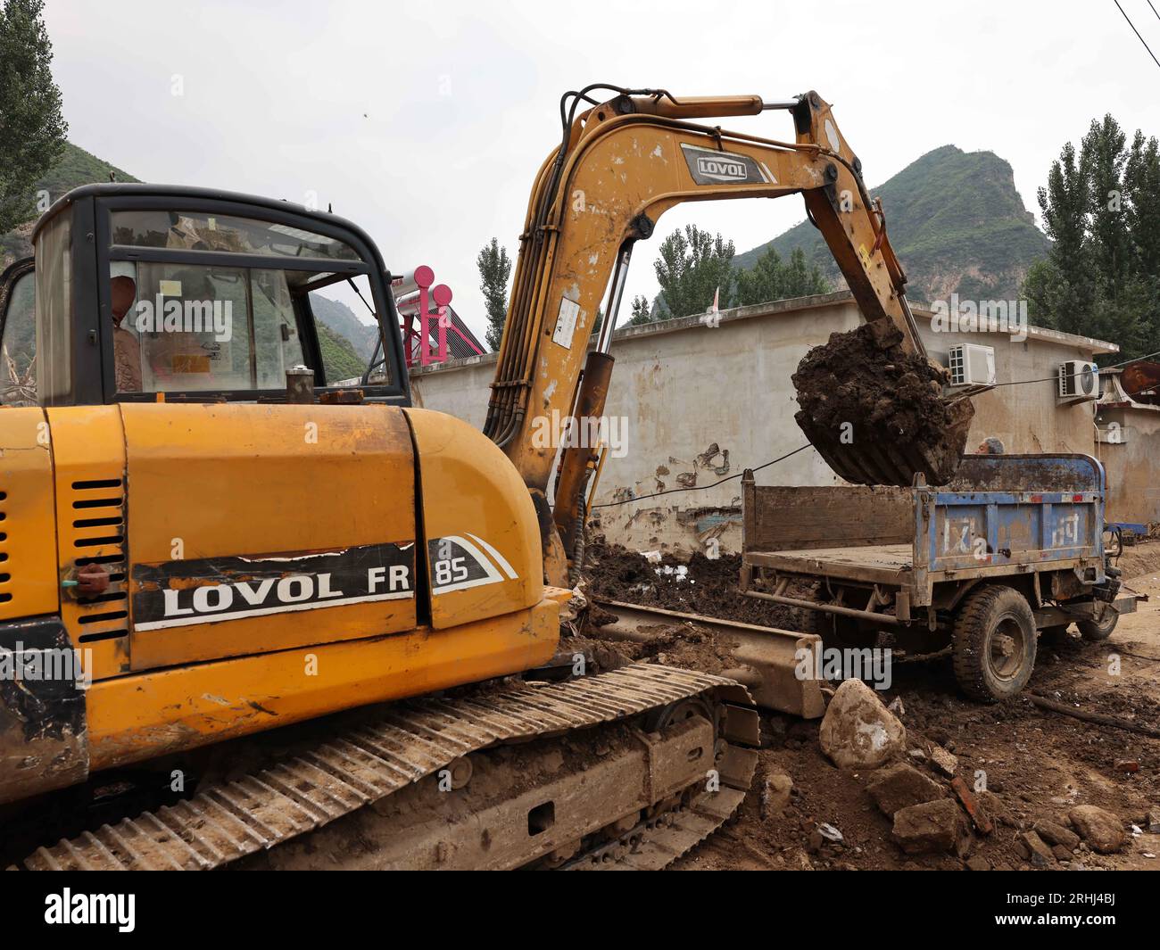 Baoding, China's Hebei Province. 17th Aug, 2023. A worker drives an ...