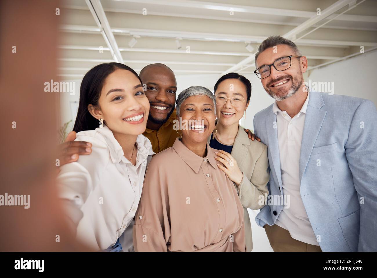 Portrait, selfie and diversity of business people smile in office for trust of global team ...