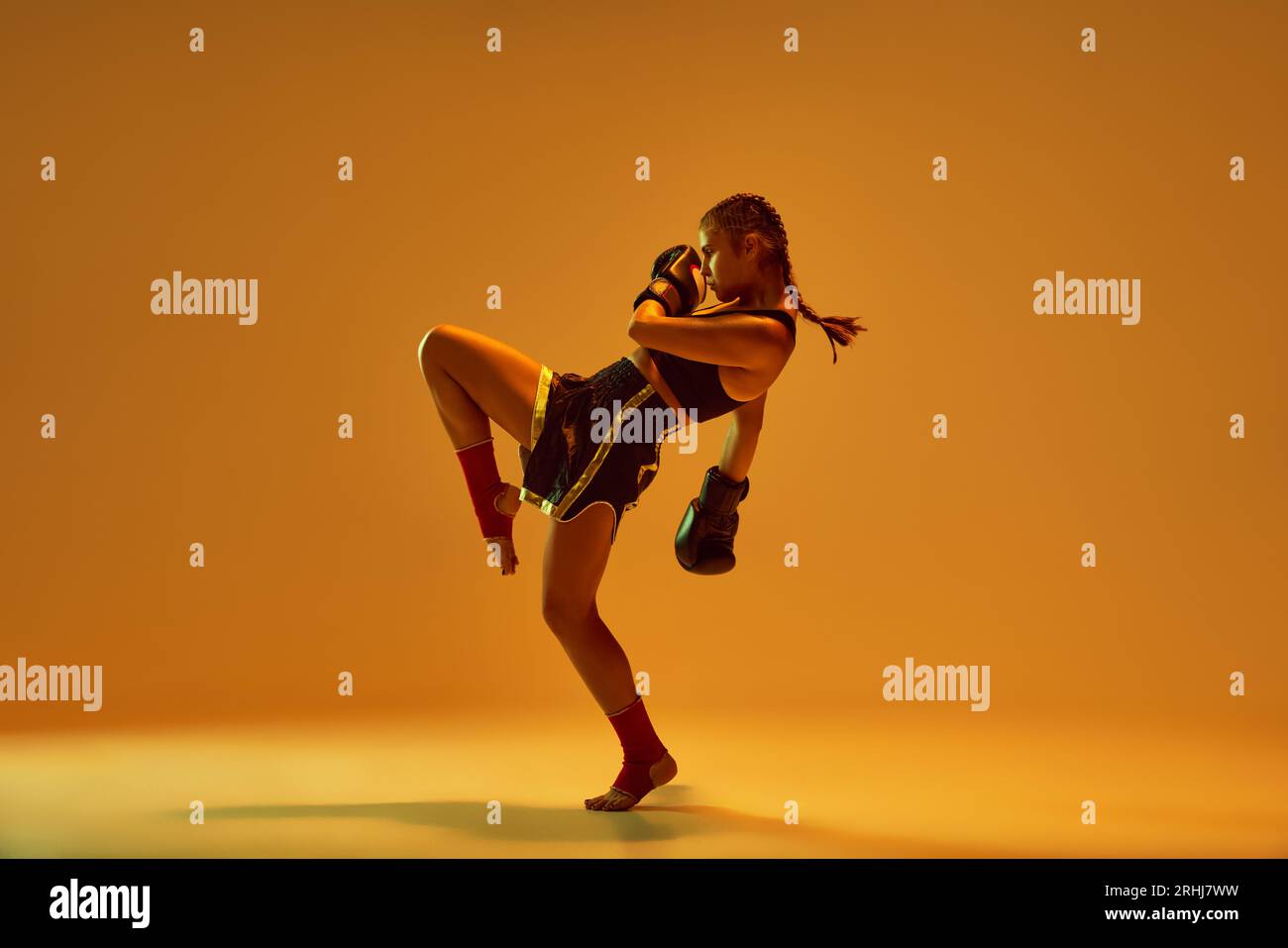 Leg kick. Sportive teen girl, mma fighter athlete in motion, training ...