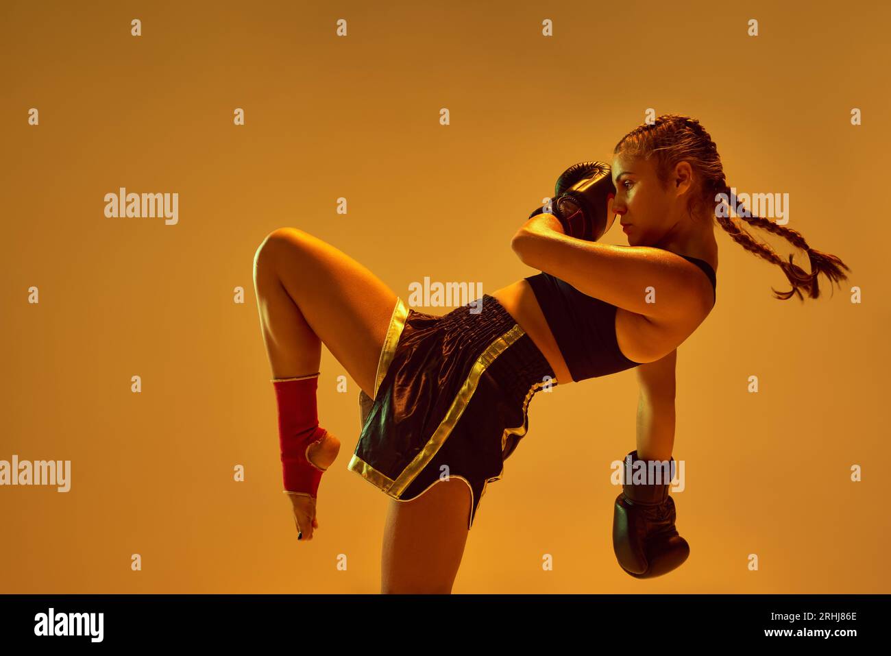 Leg kick. Sportive teen girl, mma fighter athlete in motion, training ...