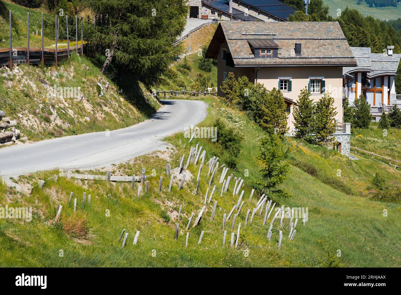 Swiss road with palisades Stock Photo - Alamy