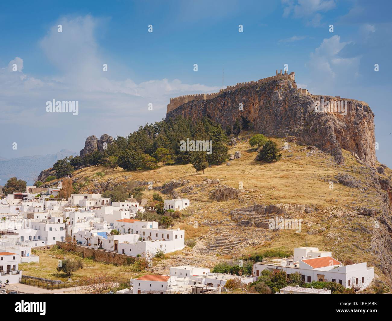 Lindos town in Greece aerial view in cloud summer day, white houses in ...