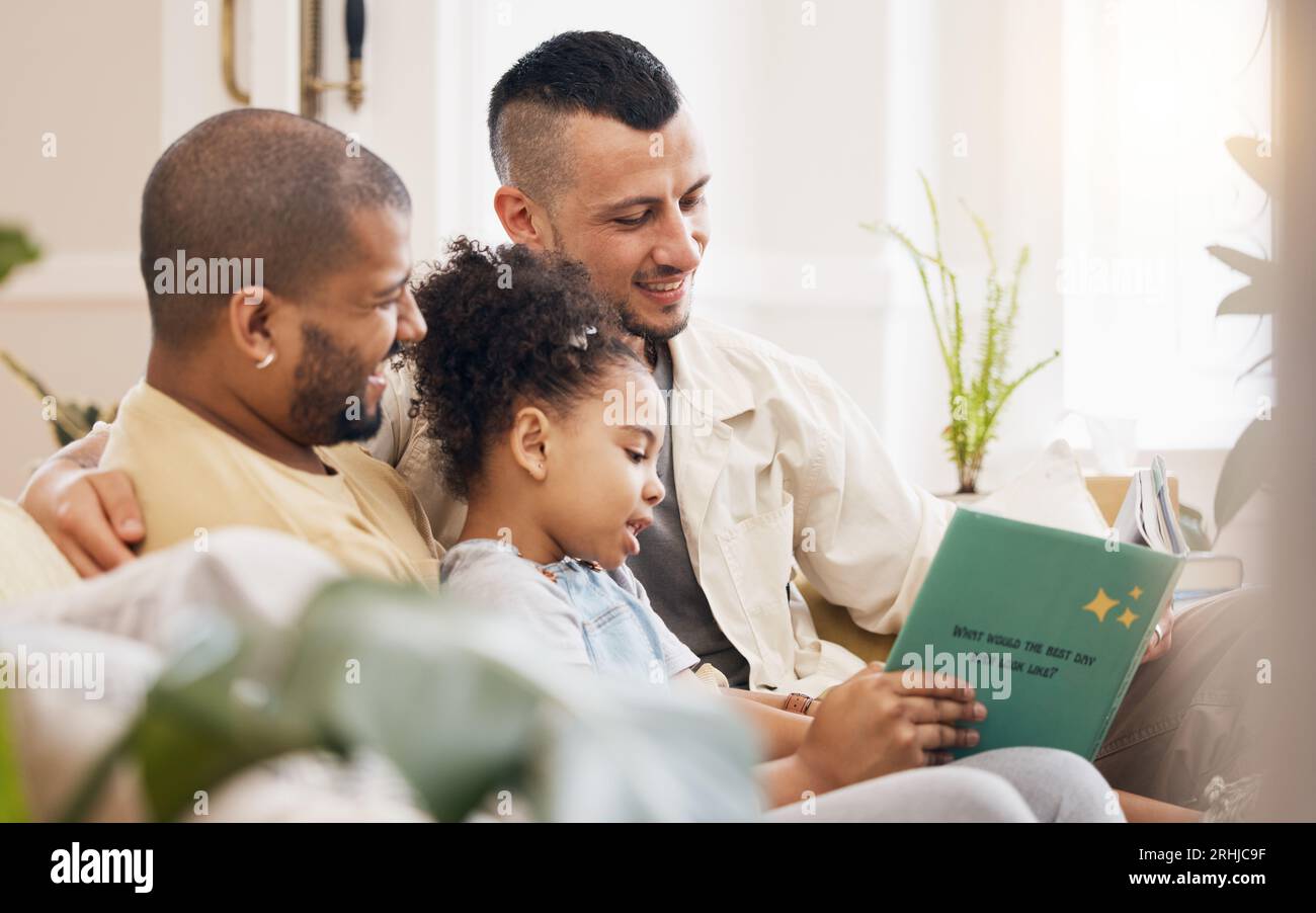 Gay couple, child and book on sofa with smile, bonding and love in ...